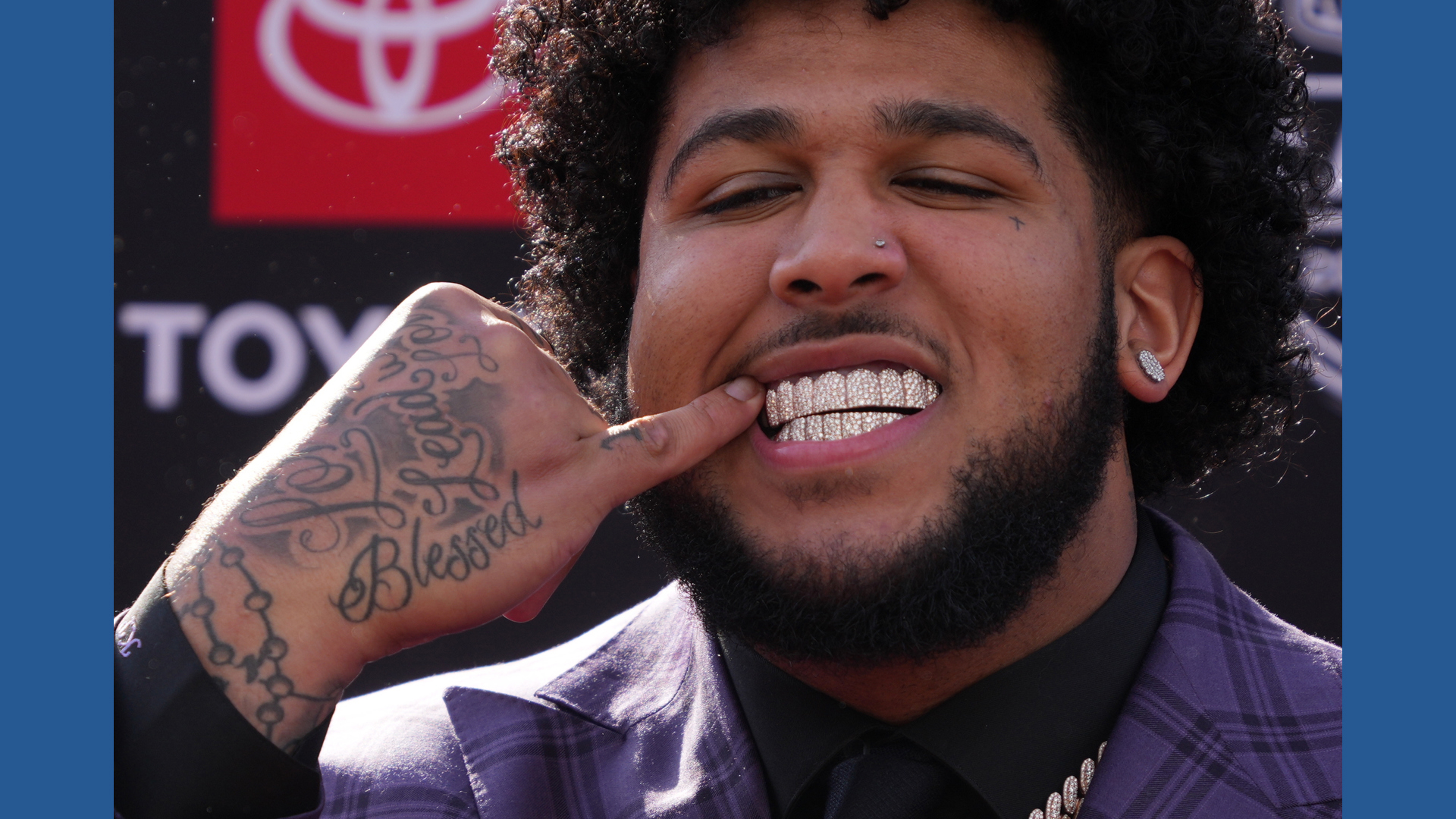 Inside the NFL draft suits: Family photos, sponsor art and a comic book ...