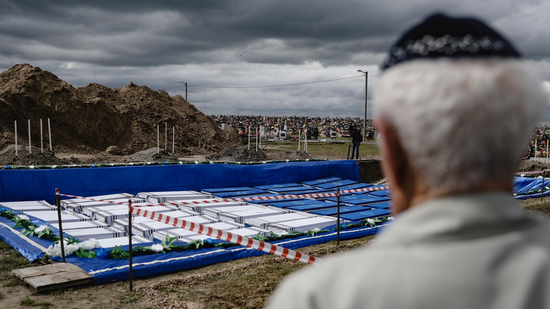Remains of 1,200 Holocaust victims laid to rest in Belarus after mass ...