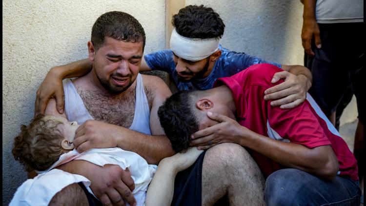 Gaza father mourns baby boy, killed in Israeli airstrike | khou.com