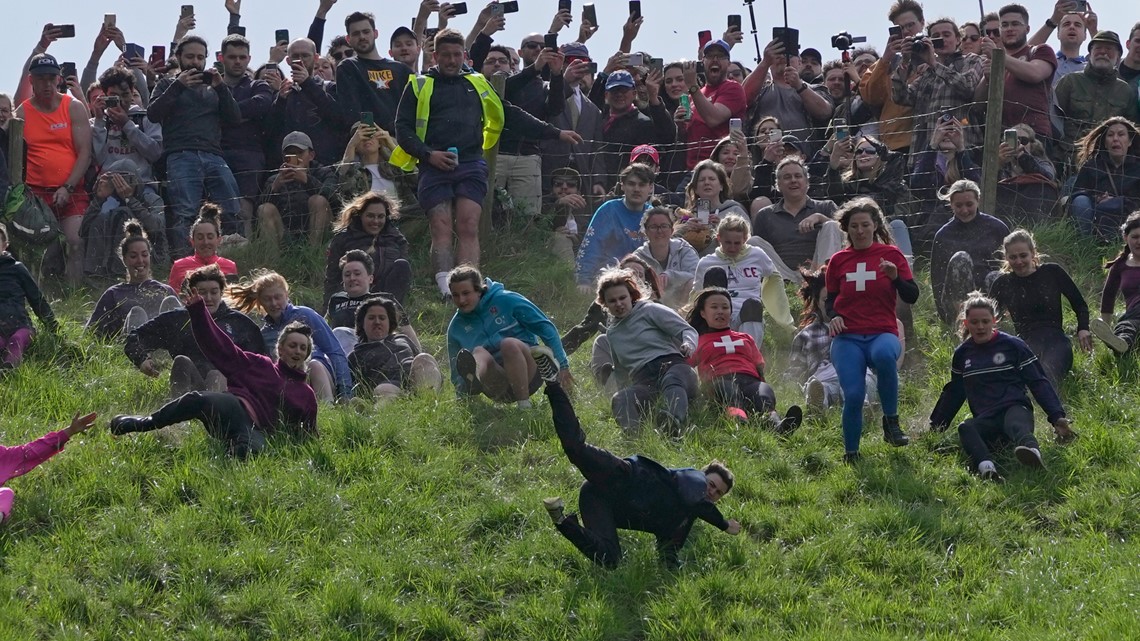 American man wins chaotic UK race chasing cheese down a hill | khou.com