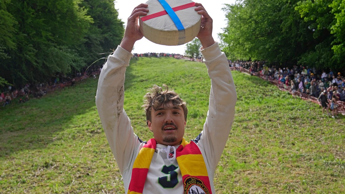 American man wins chaotic UK race chasing cheese down a hill | khou.com