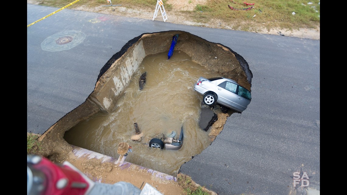 SAFD shares shocking footage, photos in wake of sinkhole tragedy | khou.com