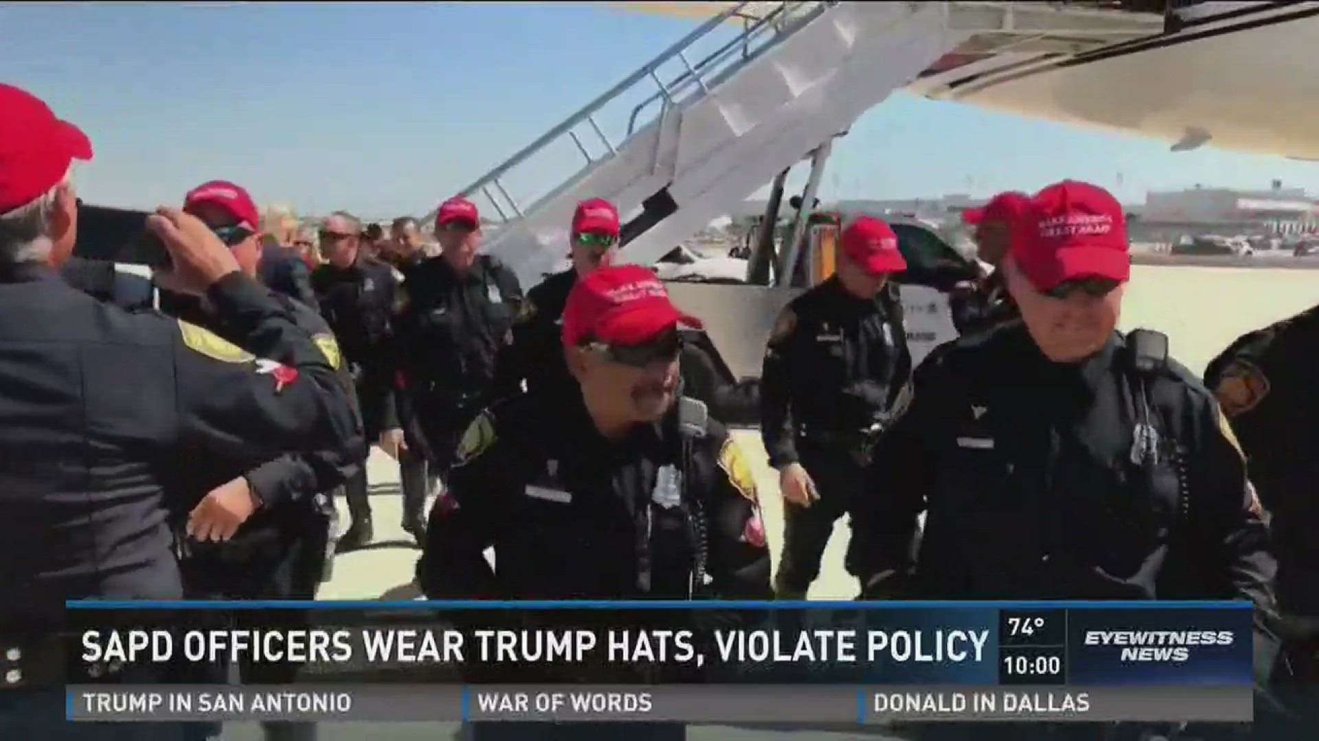 SAPD officers shown wearing Donald Trump hats with candidate | khou.com