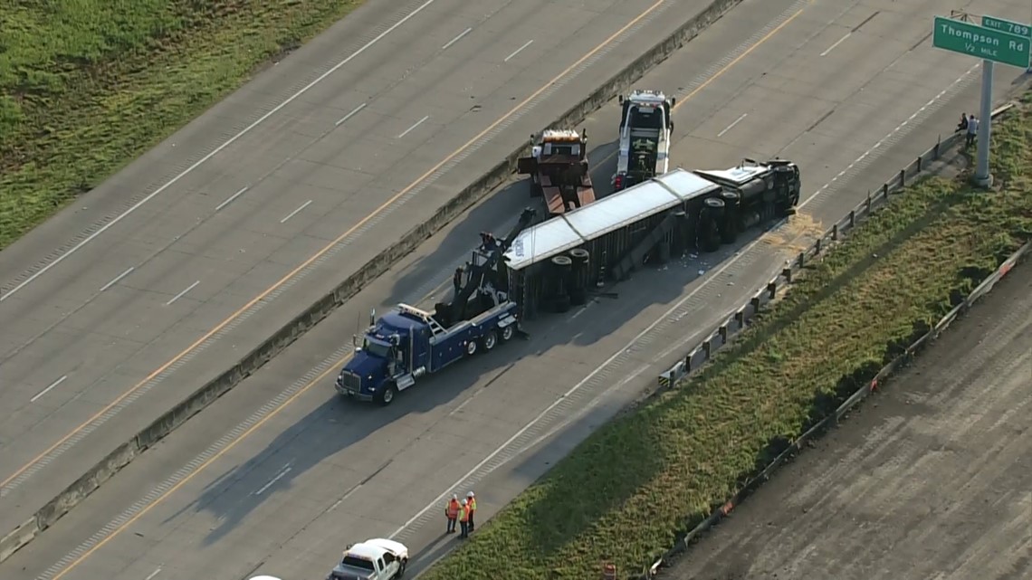 Flipped big rig shuts down I-10 East in Highlands area | khou.com