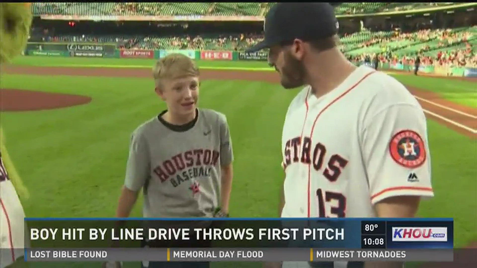 Boy hit by line drive throws first pitch at Astros game | khou.com
