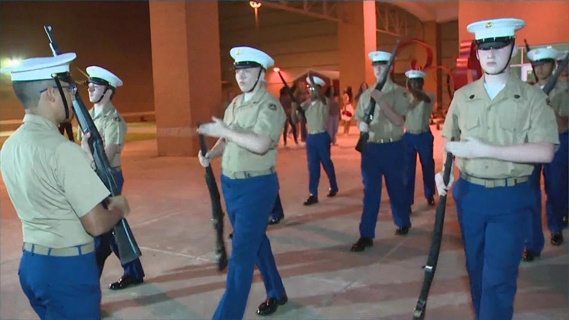 Chita chats with the Junior ROTC leader at Travis High School on first ...