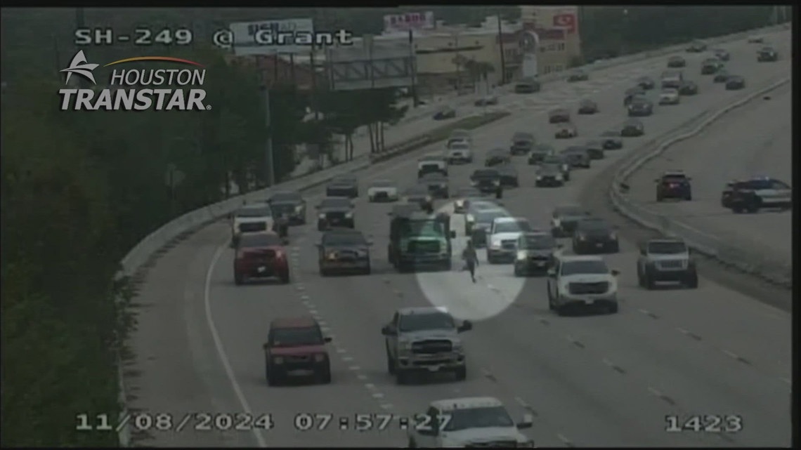 Dramatic foot chase caught on camera as suspect runs across Highway 249 ...