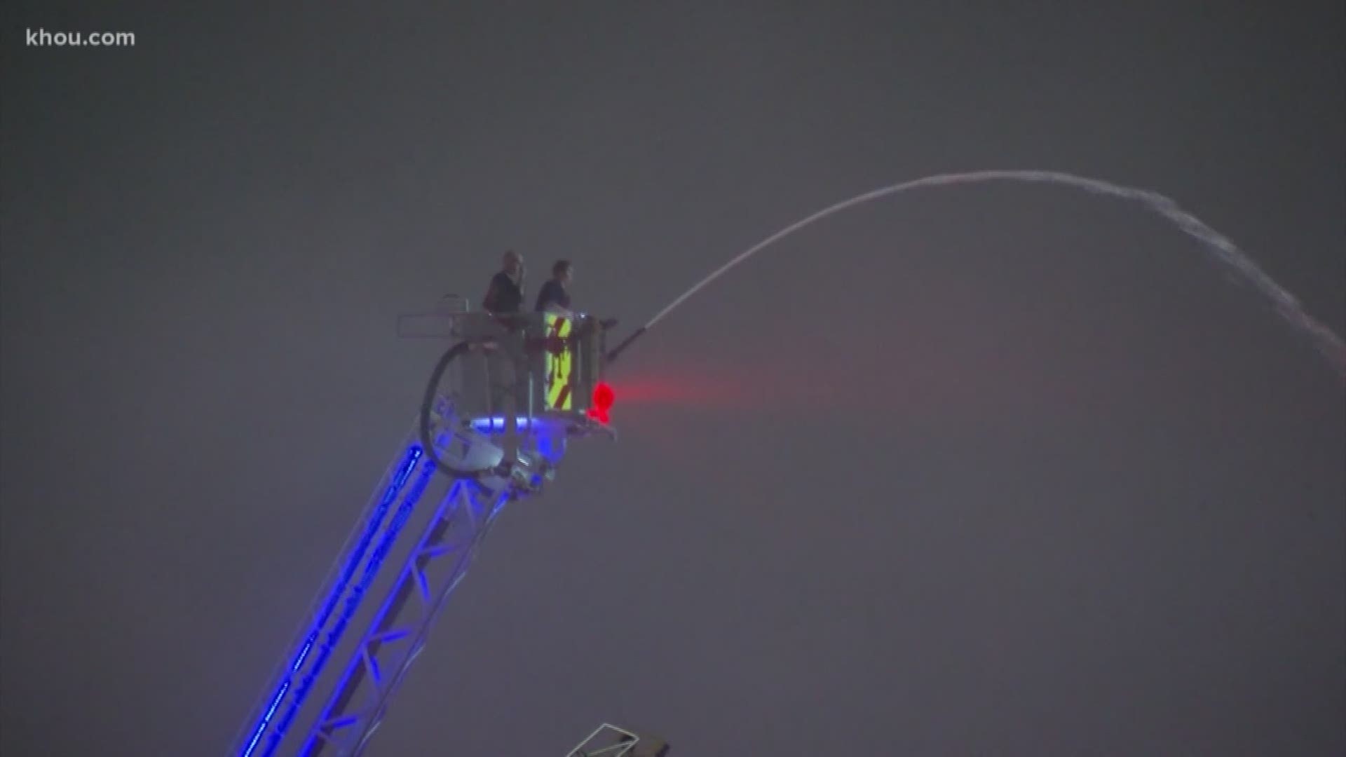 Four firefighters suffer heat exhaustion battling grain silo fire in ...