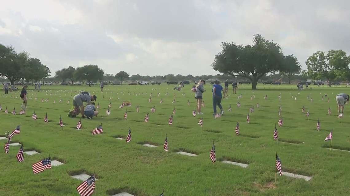 Flags planted at Houston National Cemetery to honor the fallen | khou.com