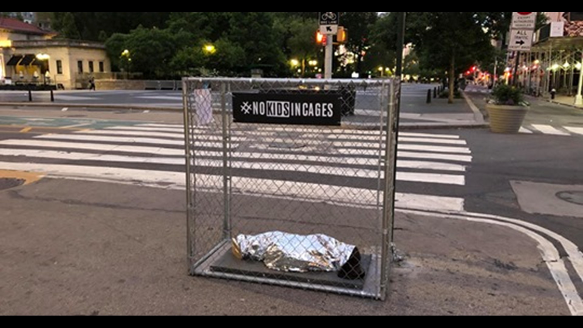 Art installations depicting crying children in cages pop up across New ...