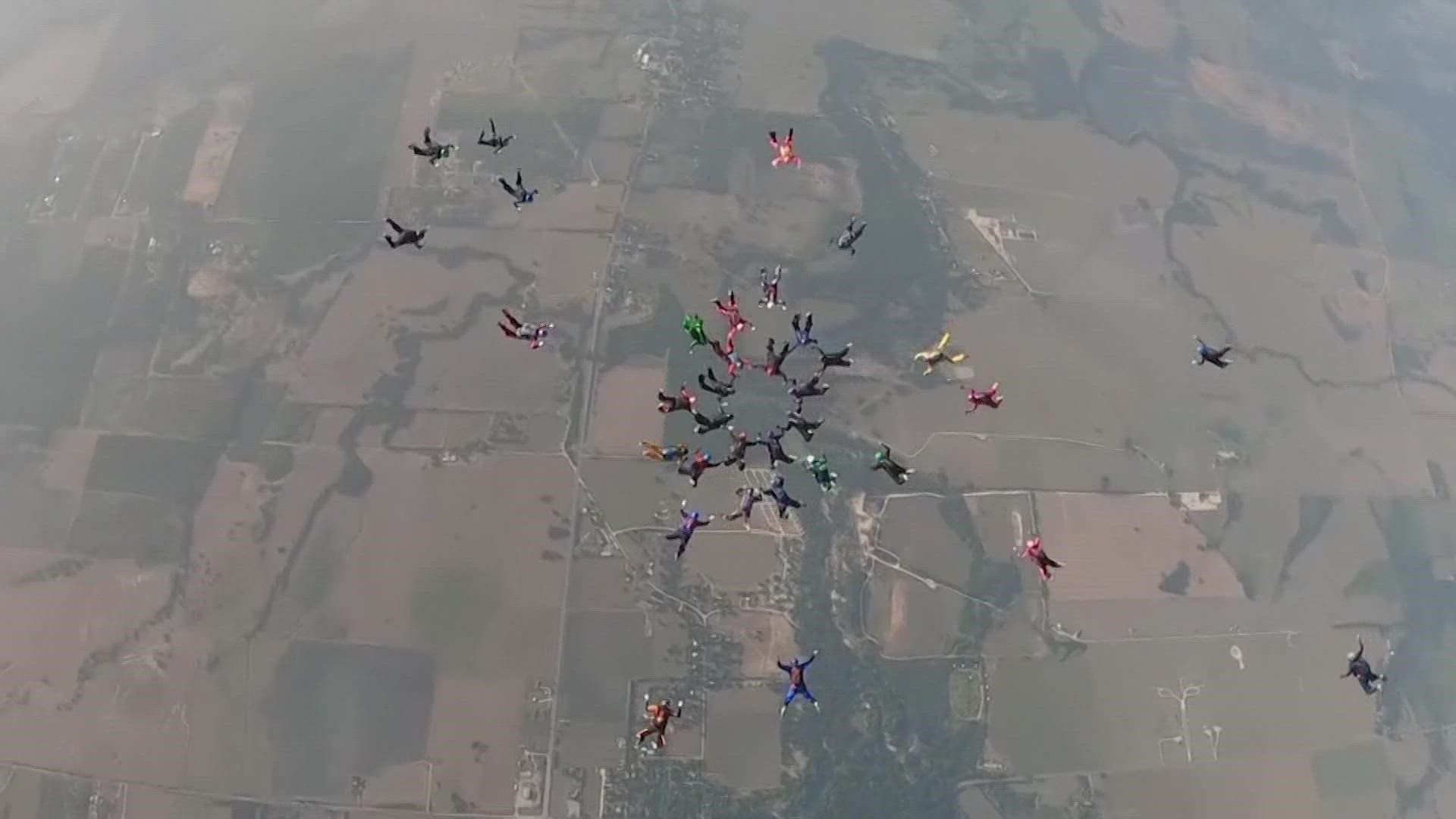 Female skydiving group breaks Texas record | khou.com