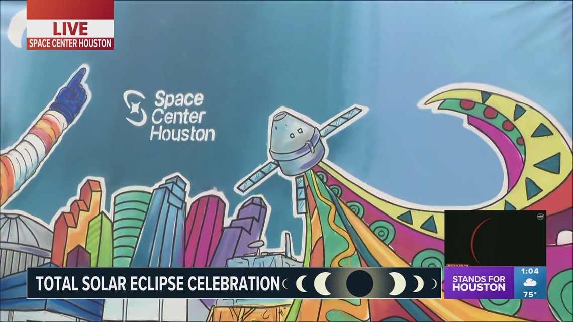Houston artist paints mural at Space Center Houston during solar ...