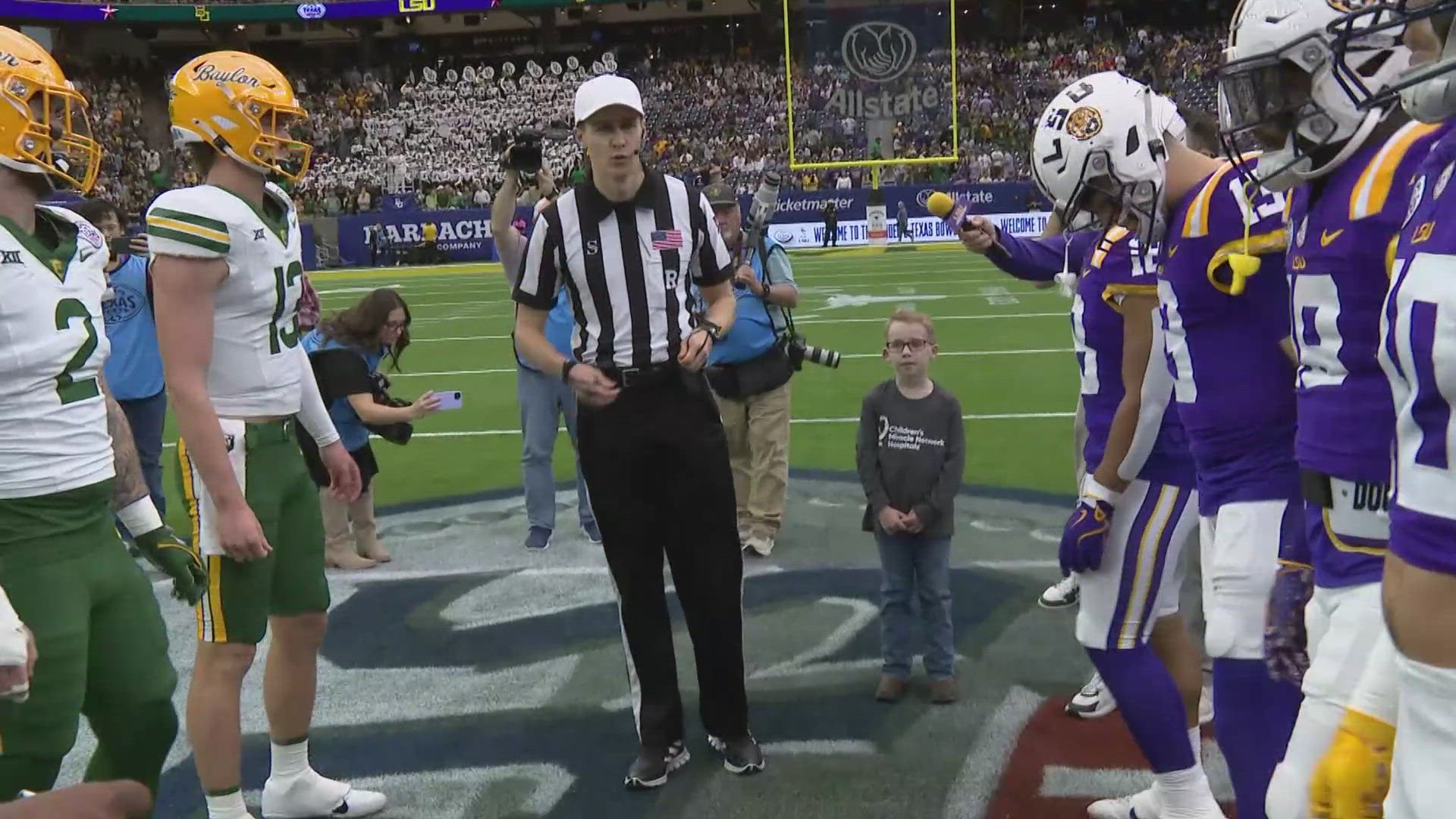 8-year-old cancer survivor honored with Texas Bowl coin toss | khou.com
