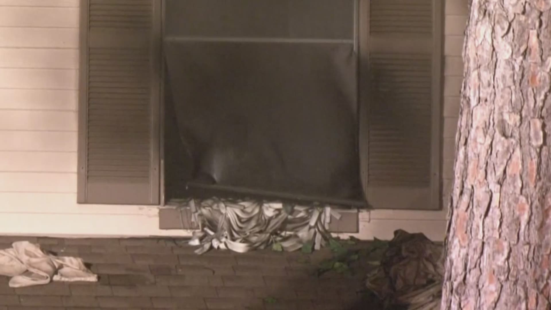 Family jumps from second story window after house catches fire | khou.com