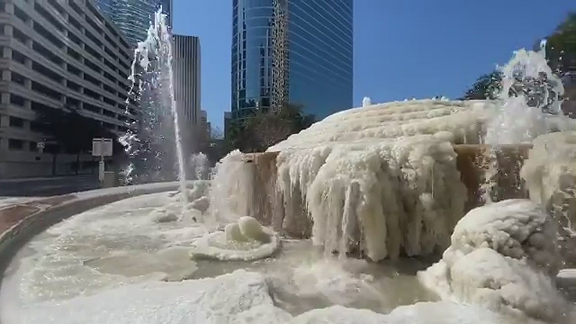 Partially frozen fountain at Polk and Smith Street in downtown Houston ...