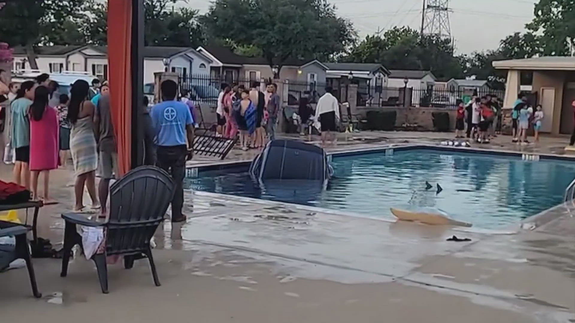 SUV crashes into Houston pool; one detained in investigation | khou.com