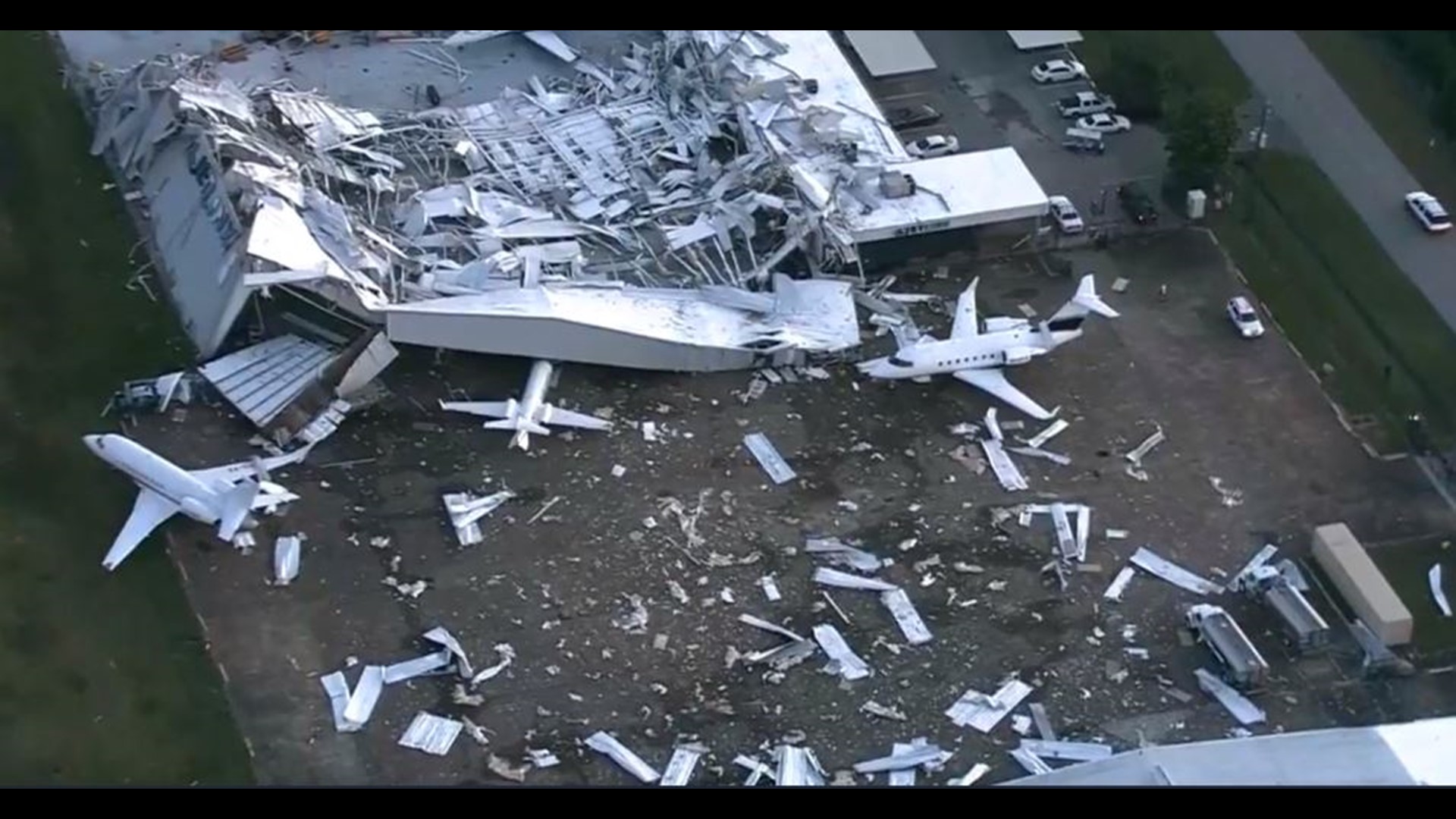 Storm's microburst destroys hangar, damages airplanes at Hobby Airport ...