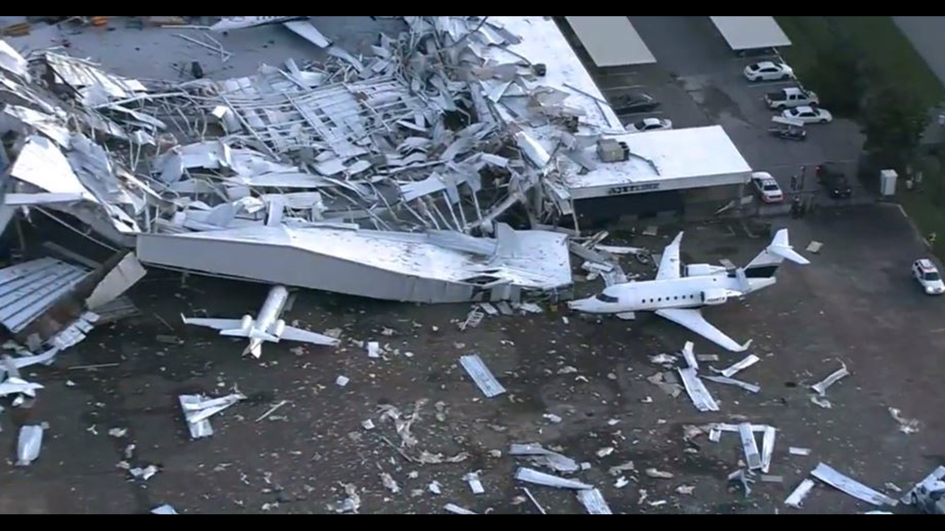 Storm's microburst destroys hangar, damages airplanes at Hobby Airport ...