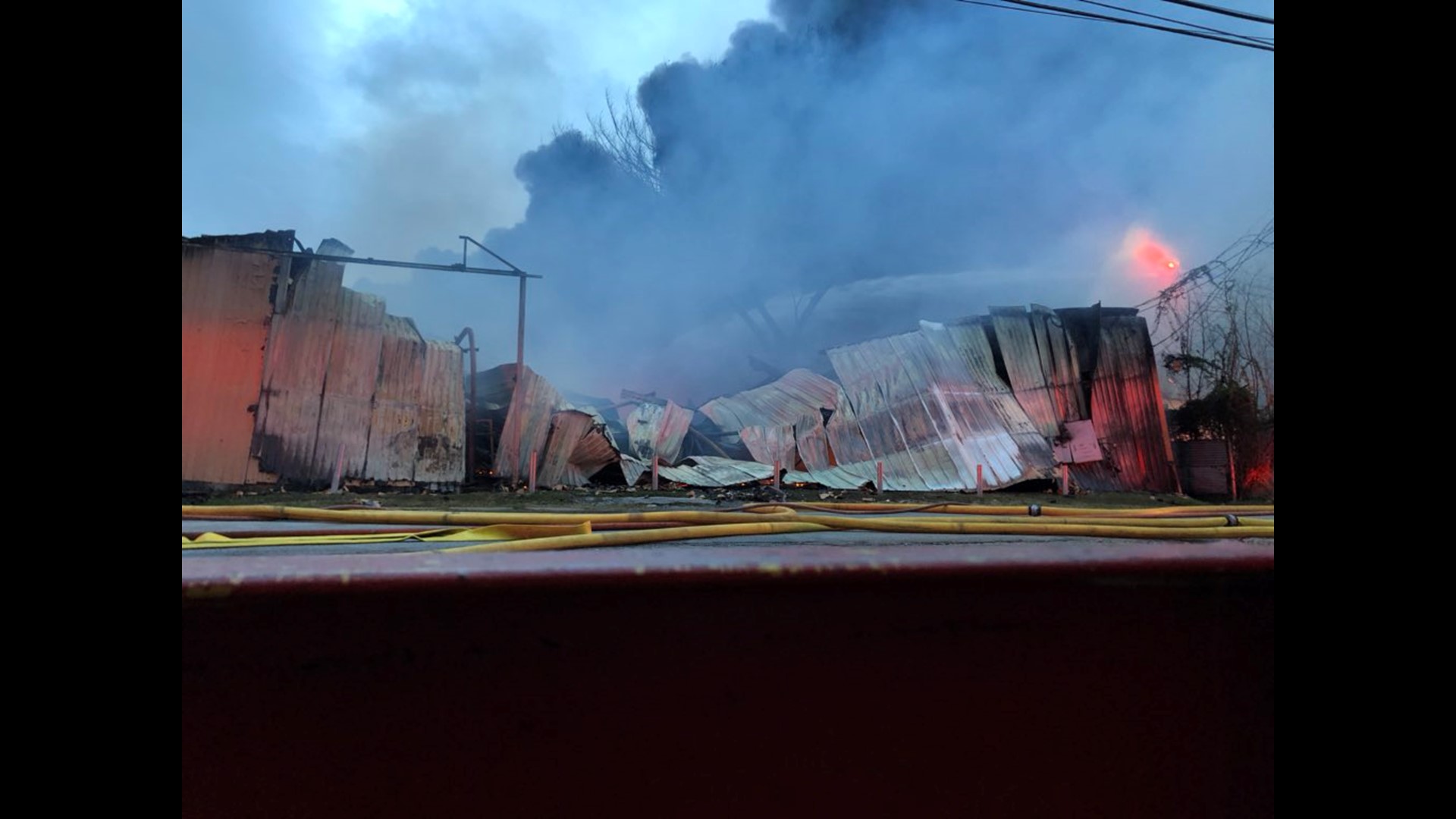 Family of eight loses home during massive warehouse fire in Second Ward ...