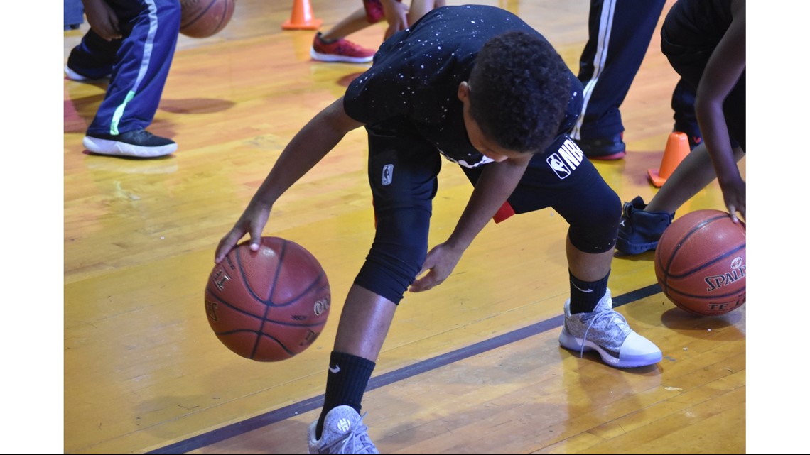 Kids learn basketball skills during Matt Musil's Hoops for Kids camp ...