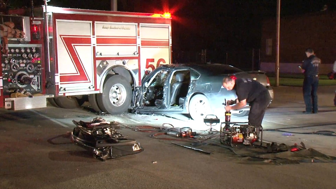 Car slams into side of fire truck backing into station | khou.com