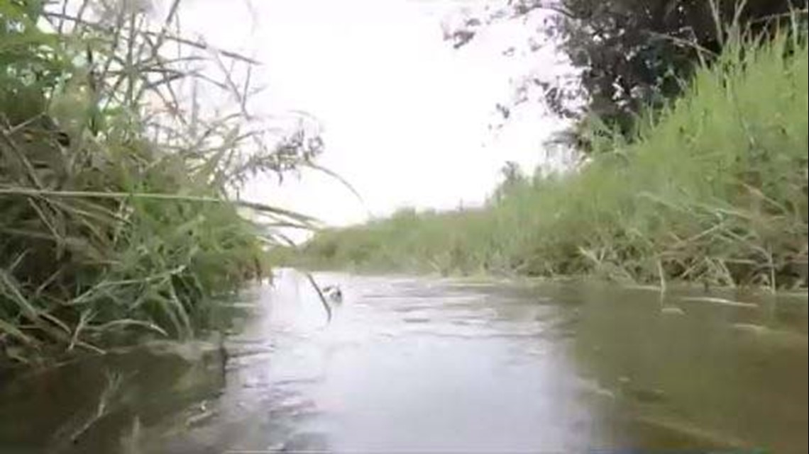 Dickinson homeowners clean clogged ditches, fear more flooding | khou.com