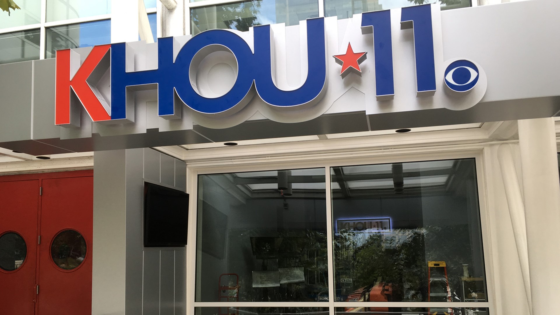 KHOU 11 sign mounted above new Avenida Studio outside GRB | khou.com