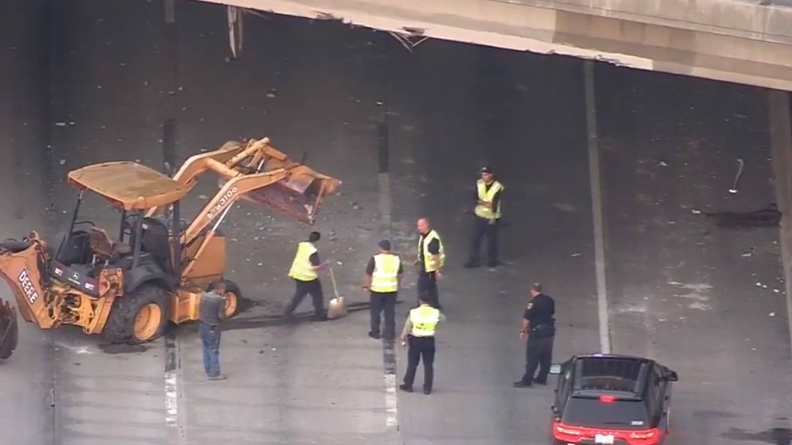Backhoe hits bridge over I-10 East, causing morning jam | khou.com