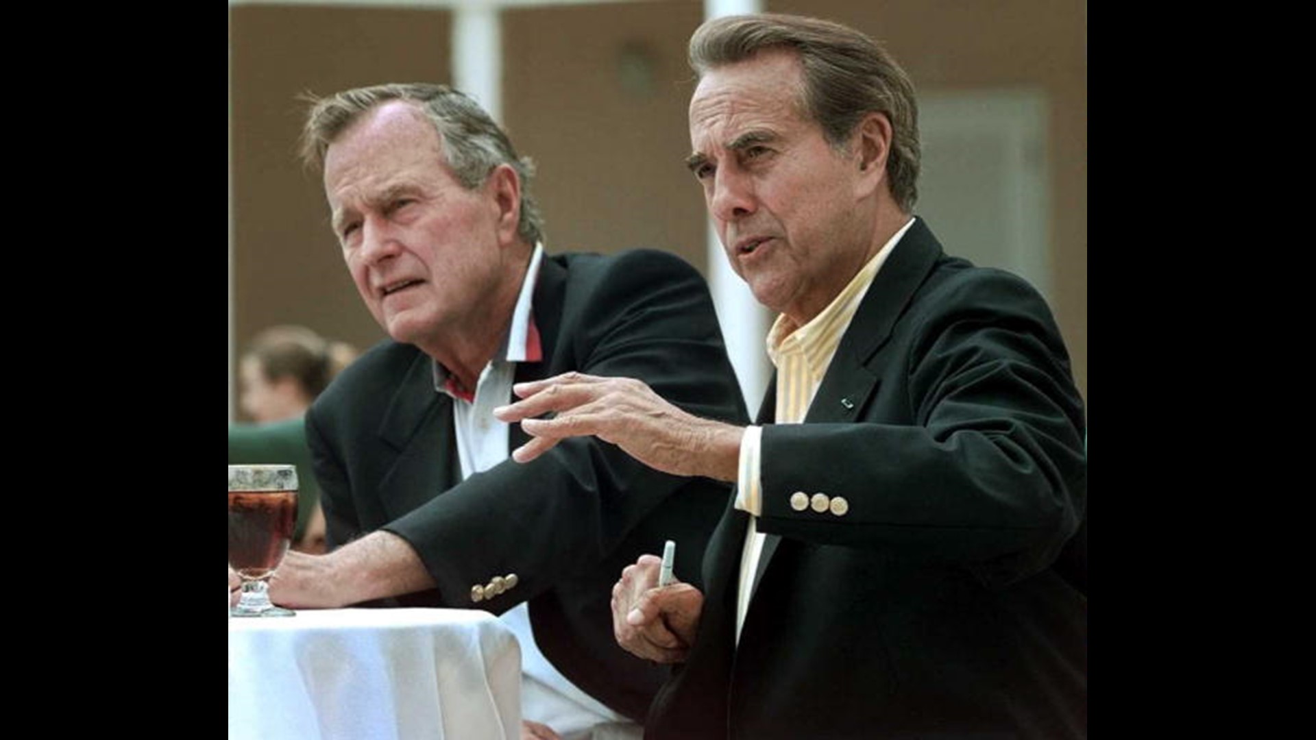Greatest Generation: Frail Bob Dole salutes fellow hero Bush 41 | khou.com