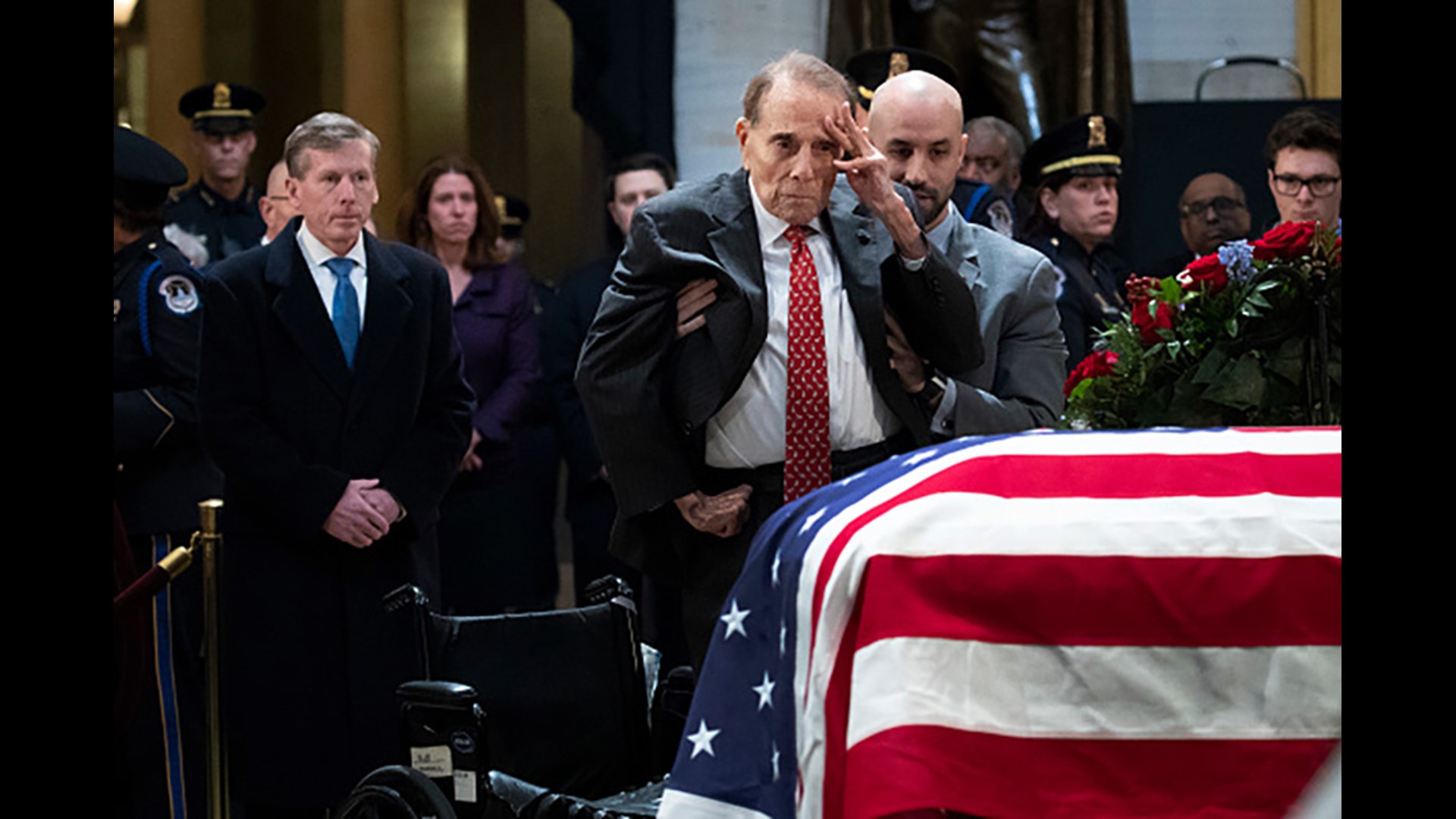 PHOTOS: Bob Dole pays respects to long-time friend Bush 41 | khou.com