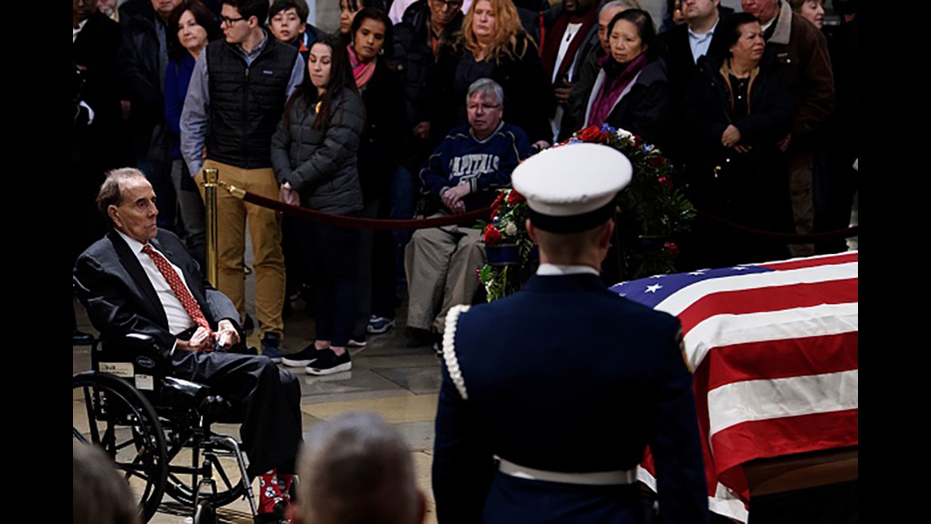 Greatest Generation: Frail Bob Dole salutes fellow hero Bush 41 | khou.com