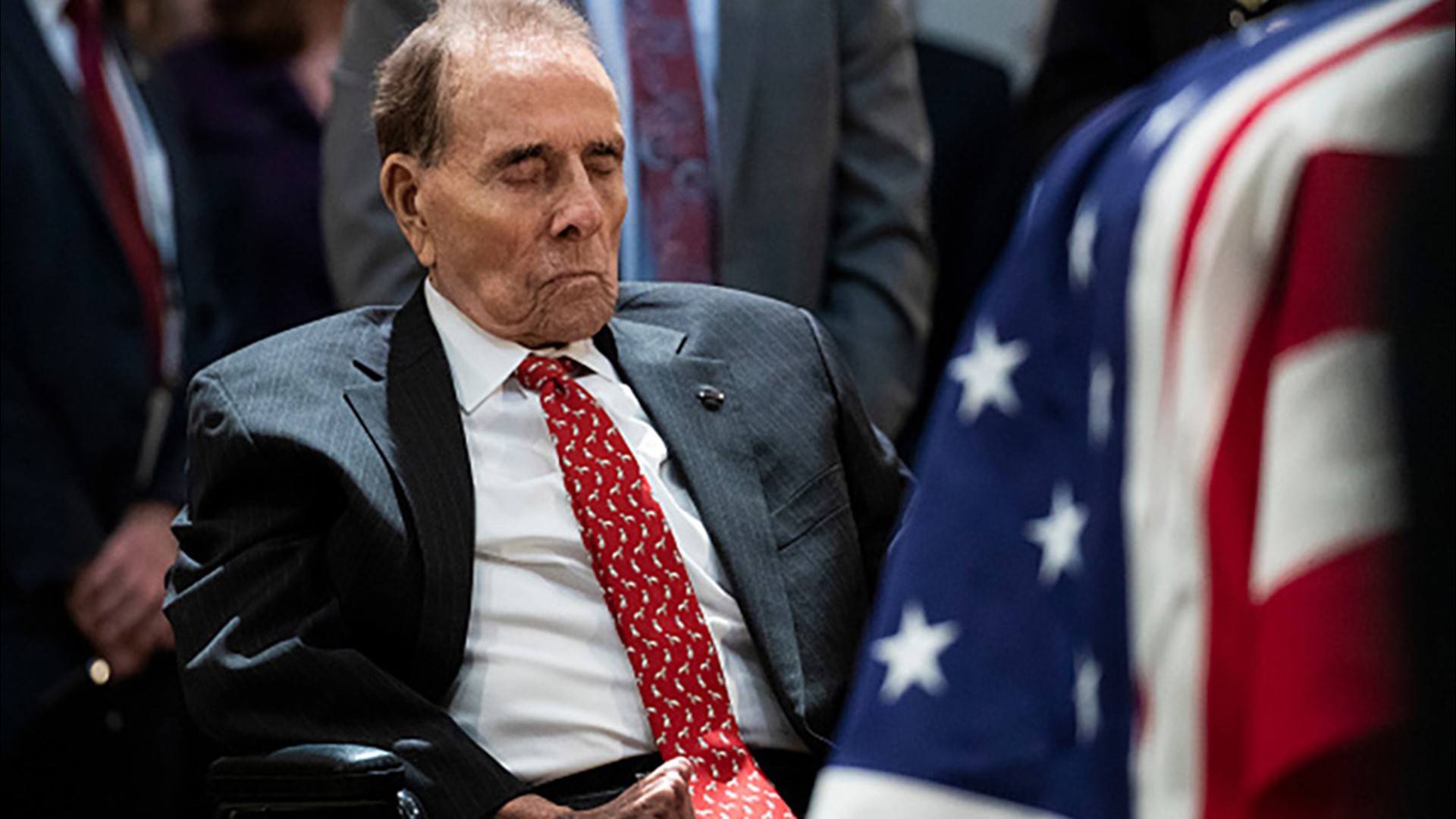 Greatest Generation: Frail Bob Dole salutes fellow hero Bush 41 | khou.com