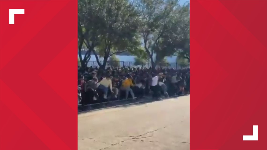 Stampede of people storm towards entrance at Astroworld Festival | khou.com