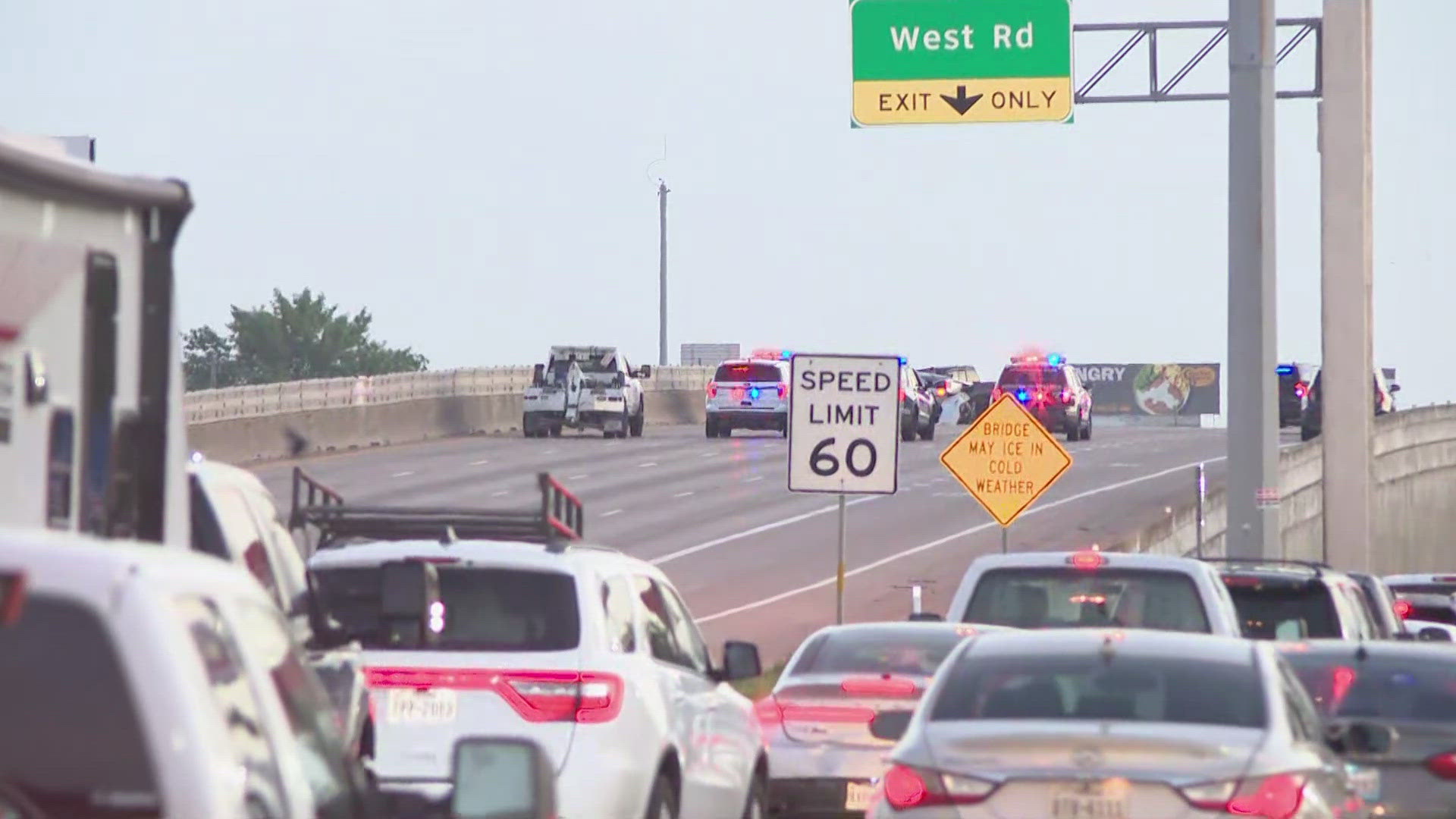 Woman killed after hit while pushing car on North Freeway at 249, HPD ...