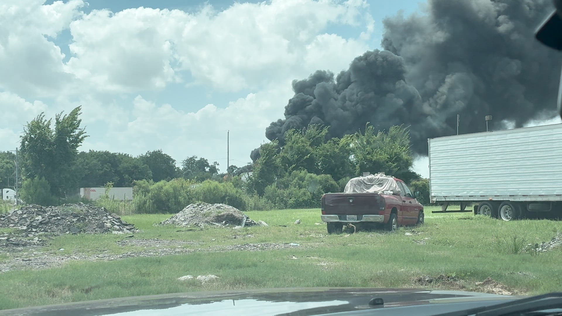 Fire burns outside warehouse on Houston's East End | khou.com