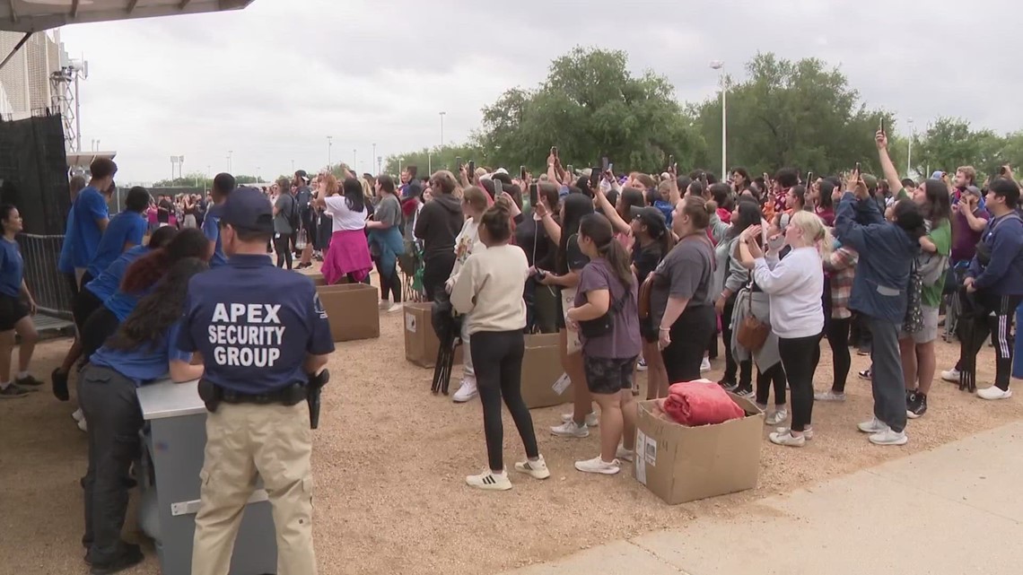Swifties line up for Taylor Swift merch at NRG | khou.com
