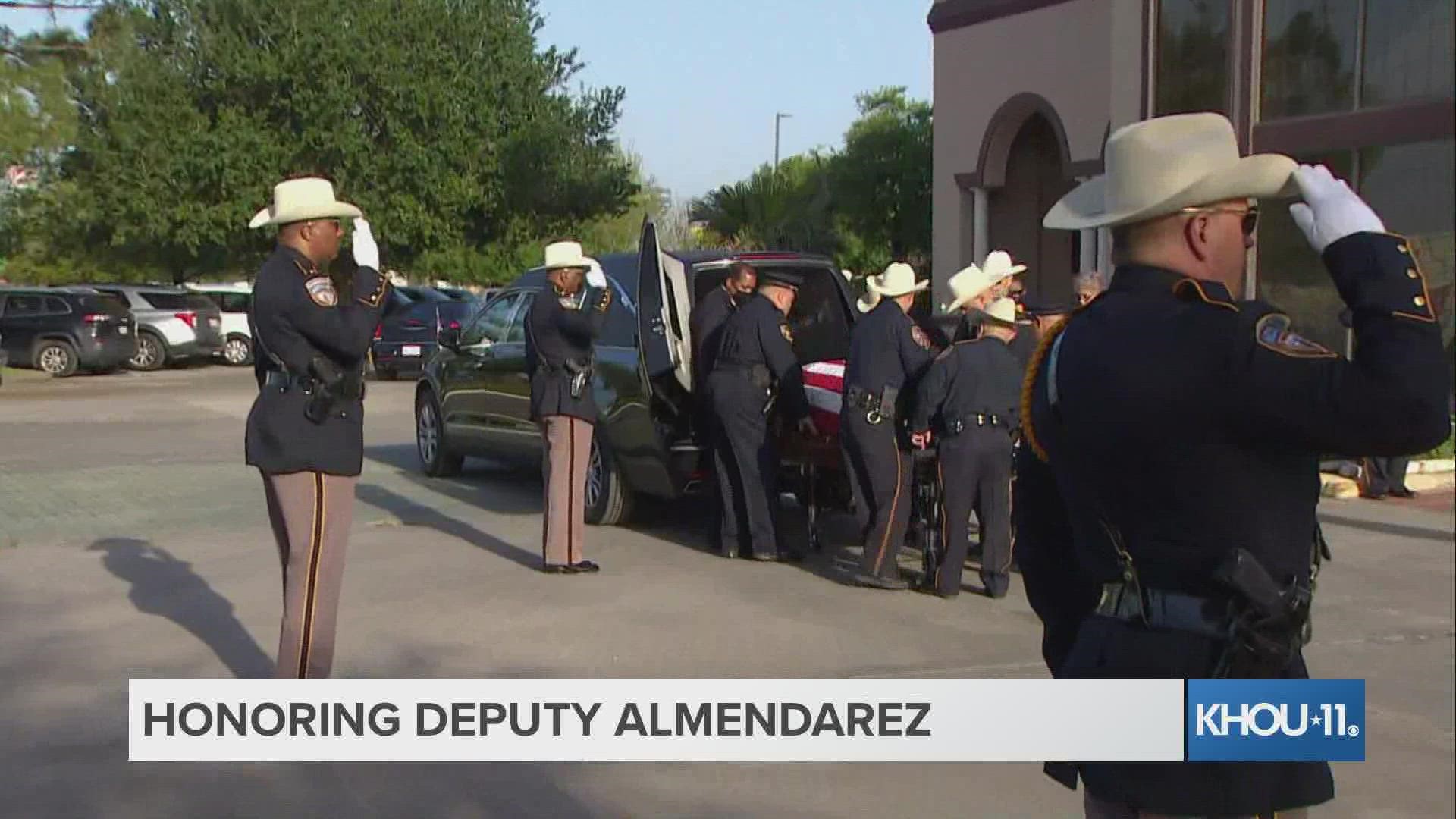 Honoring HCSO Deputy Darren Almendarez: Procession to church for ...