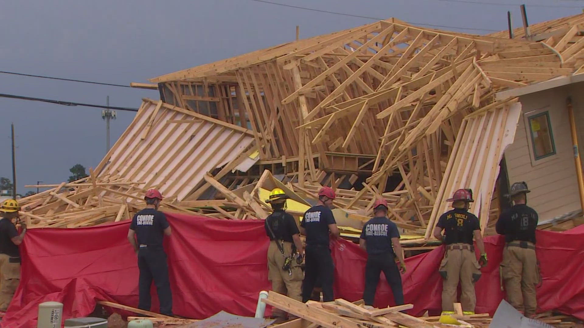 Worker trapped when house under construction collapses during storm in ...
