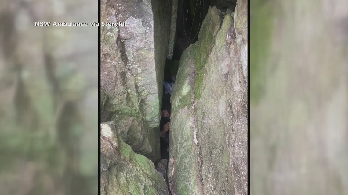 Woman gets stuck between boulders upside down for seven hours after ...