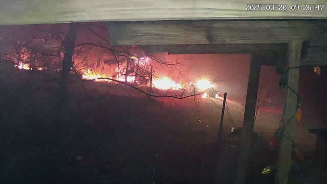 Watch: Surveillance video shows firefighting close to homes | khou.com