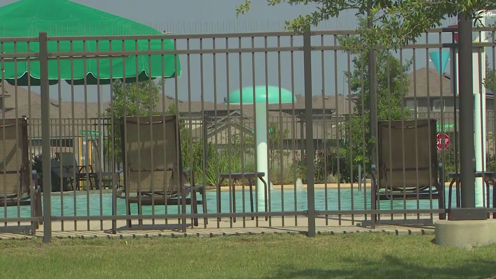 Family saves child from drowning in community pool in Spring | khou.com