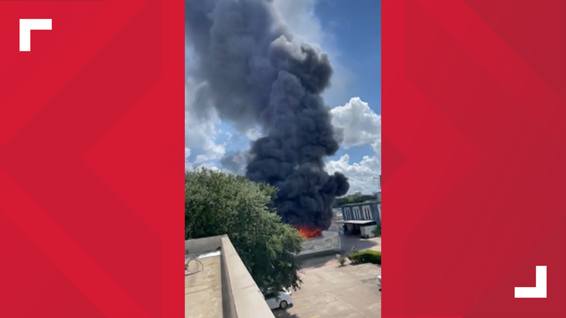 Business along Katy Fwy catches fire; smoke visible for miles | khou.com