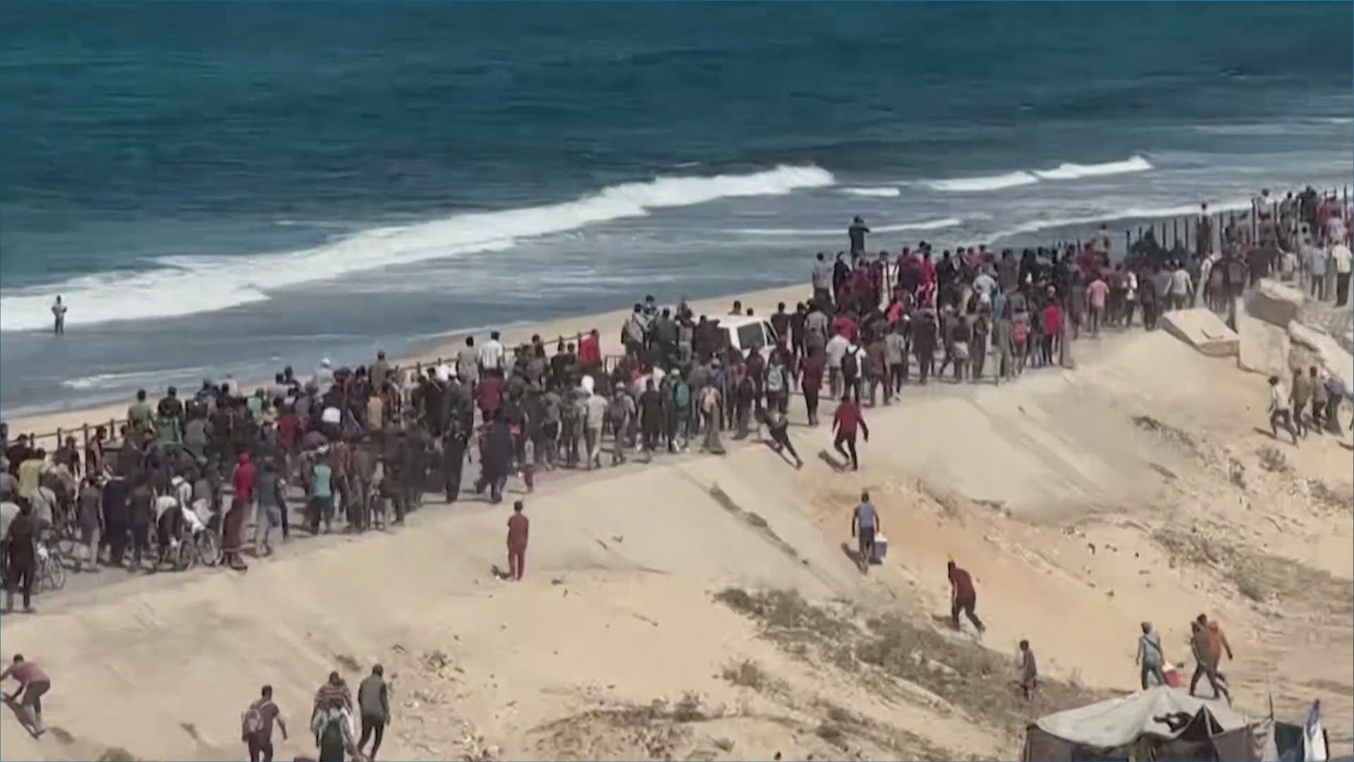 Droves of men, women, children seen along coastal road as ceasefire in ...