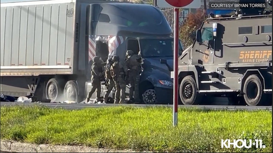 SWAT team pulls driver out of big rig after slow chase chase and ...
