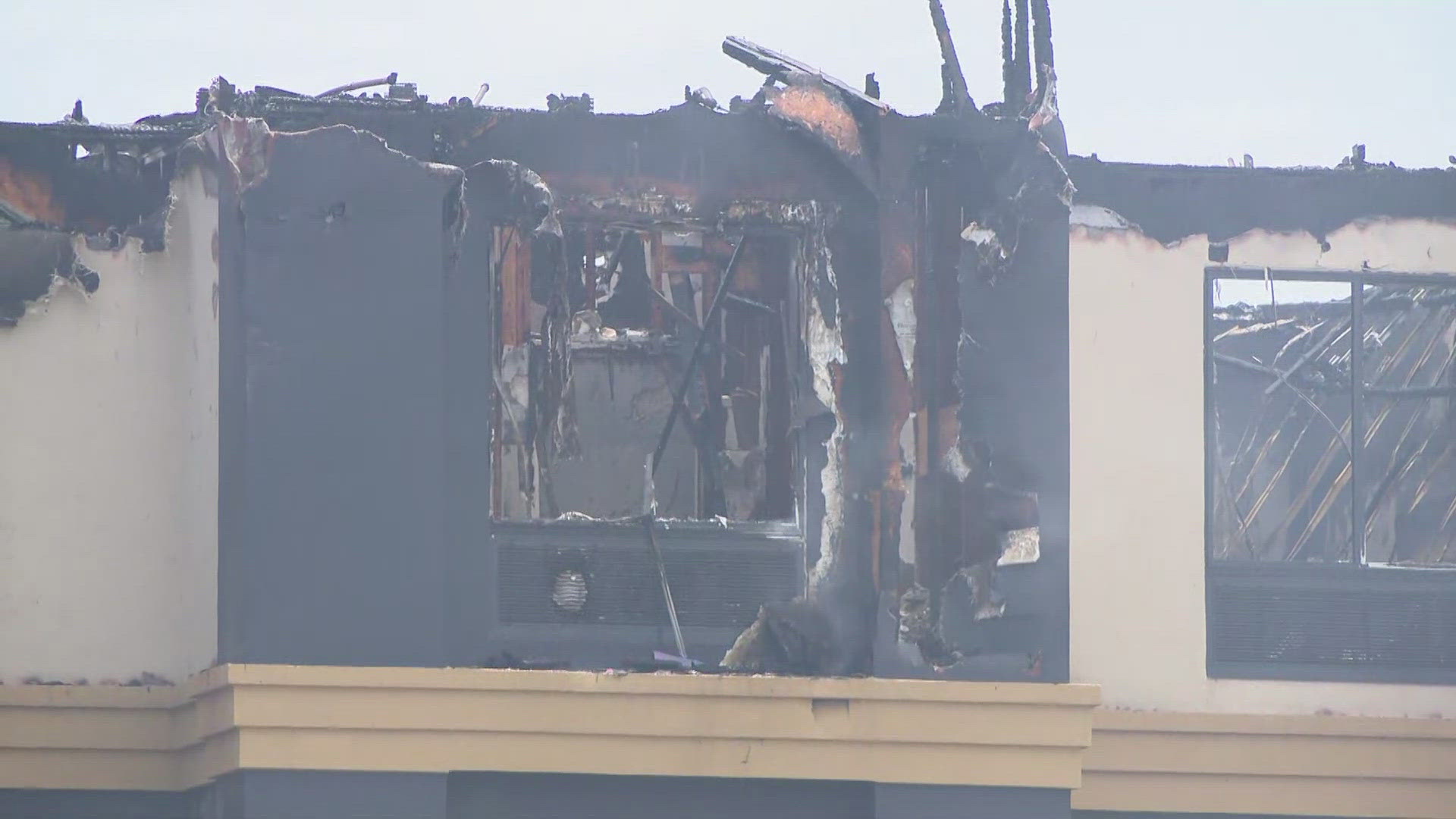 Massive fire guts vacant hotel along I-10 near Sheldon, collapses roof ...