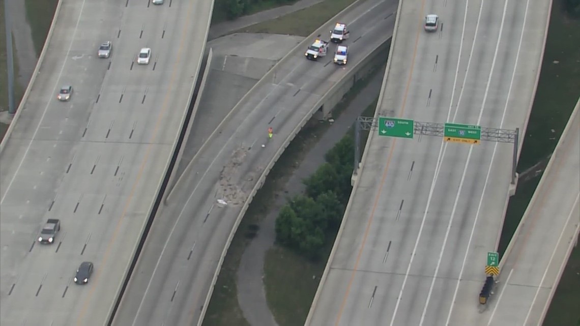 Wrong-way wreck sends car off overpass on North Loop | khou.com