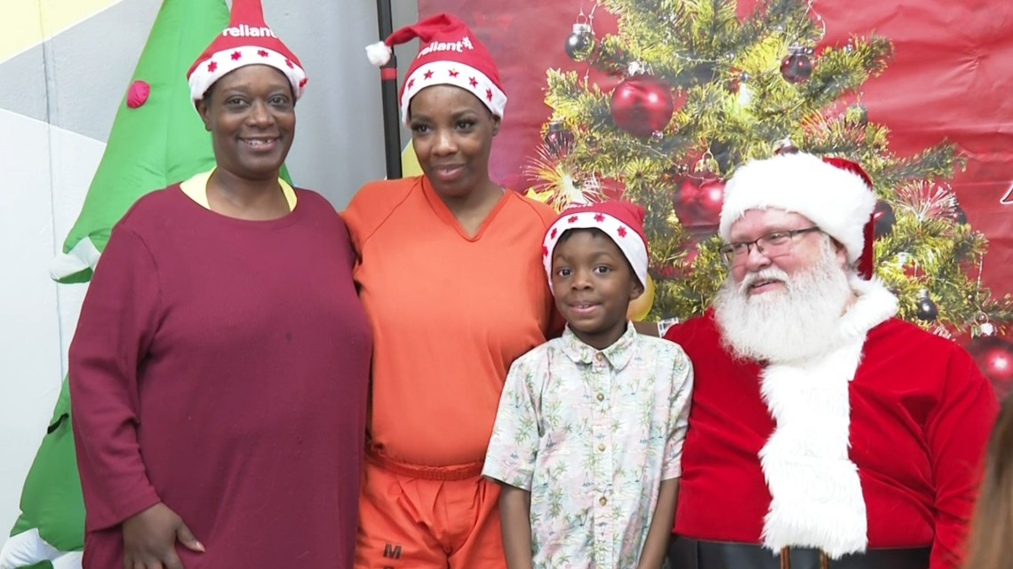 Harris County inmates open Christmas gifts with their children | khou.com