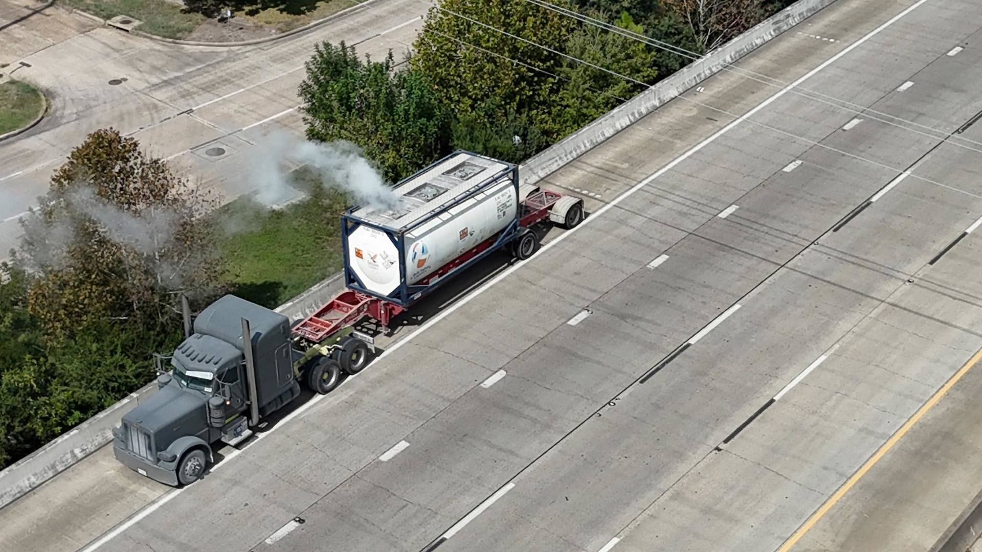 Freeway shut down in Baytown due to smoking tanker truck | khou.com