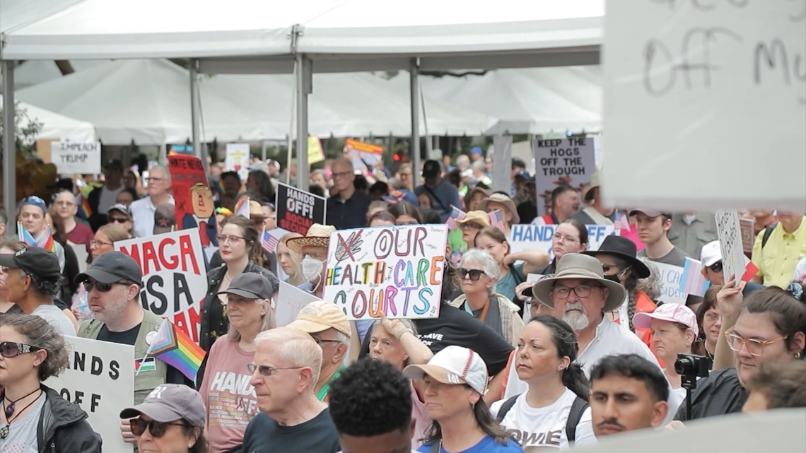 Houston protest: Hundreds protest Trump over government downsizing ...