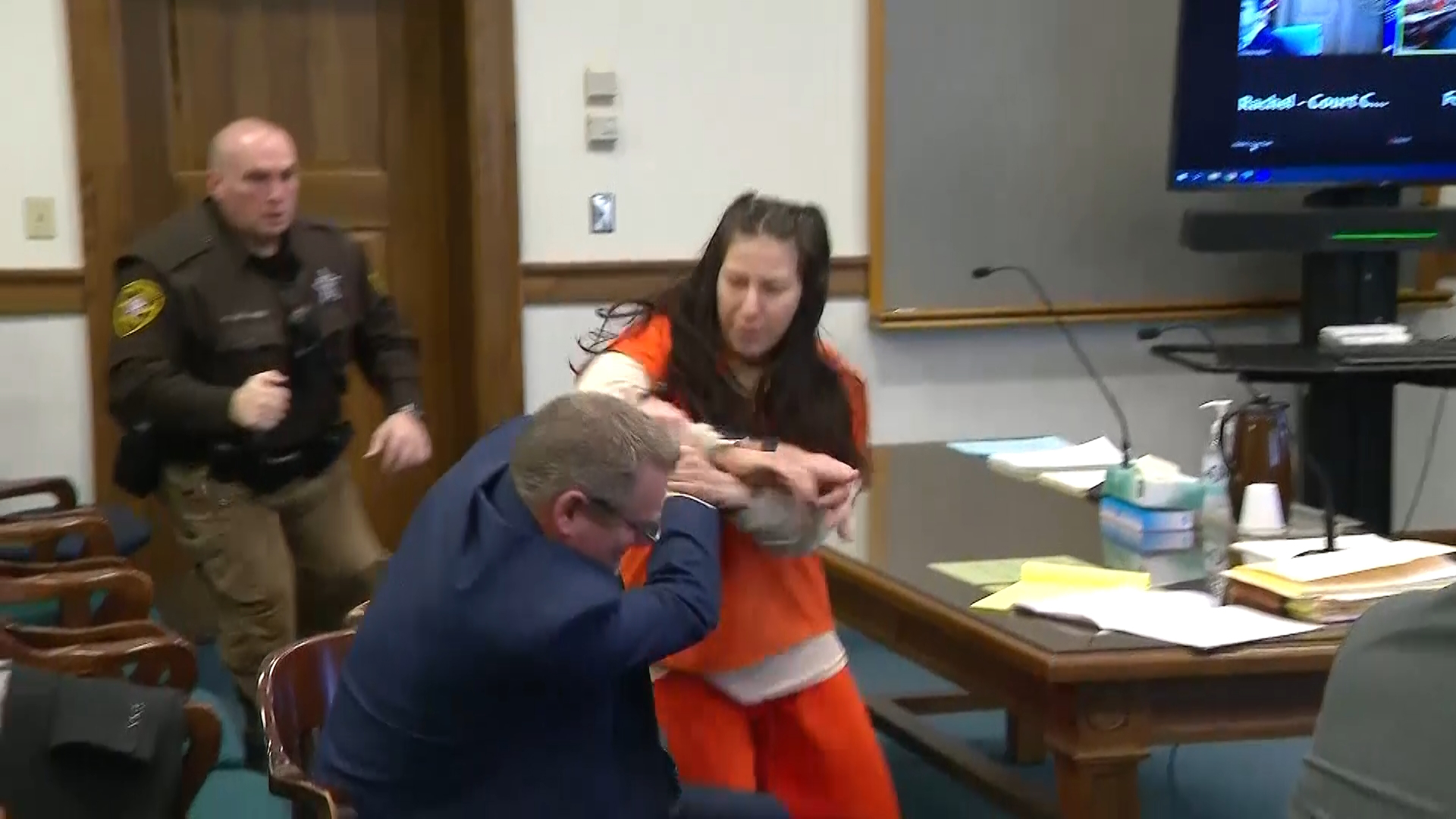 Caught on camera: Woman attacks attorney during court hearing in ...